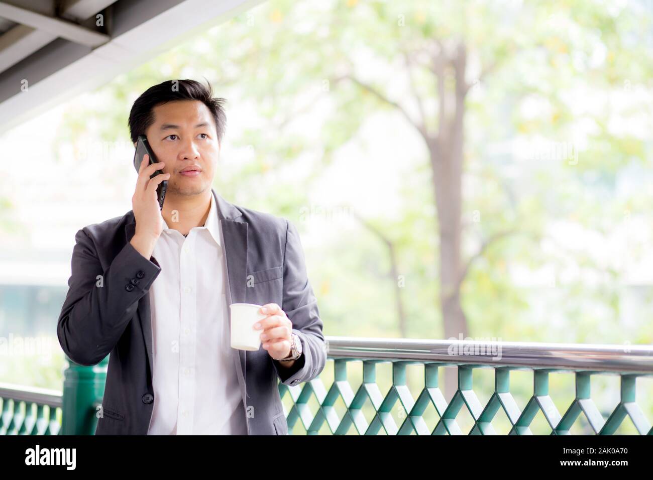 Business man suit smart phone talking call hi-res stock photography and ...