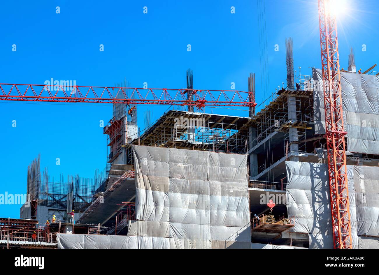 Workers are working on construction sites in the structural steel beam ...
