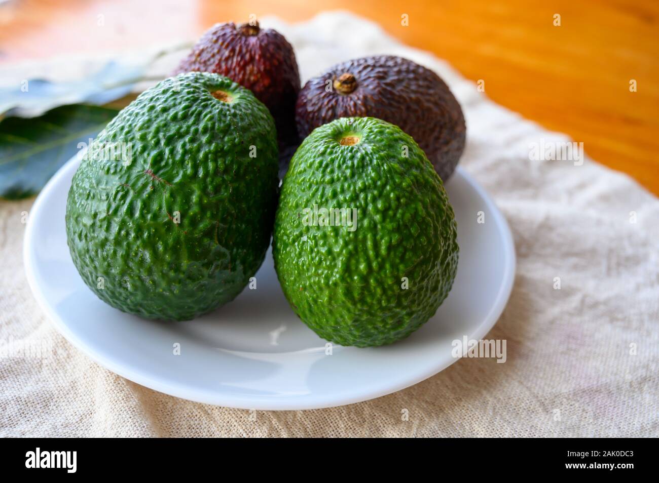 Fresh ripe green and brown avocados fruits ready to eat close up Stock ...