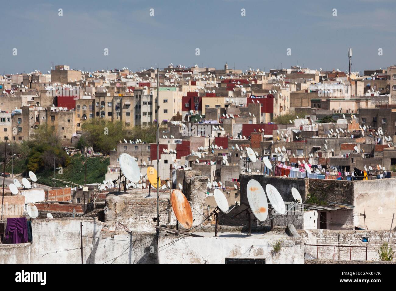 Many satellite dishes on the rooftops of buildings in Fes (also known ...