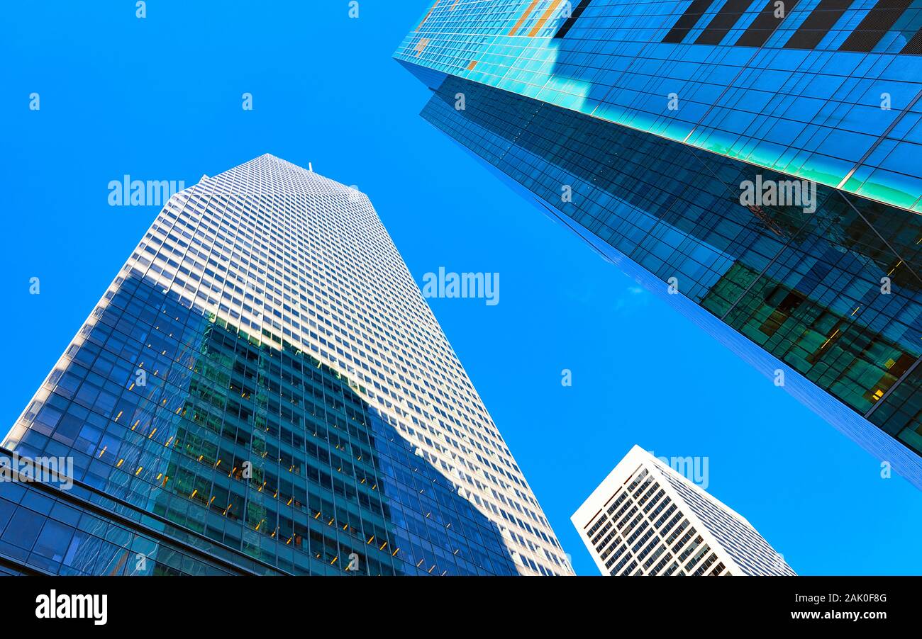 Bottom up view of glass skyscrapers in New York USA reflex Stock Photo ...