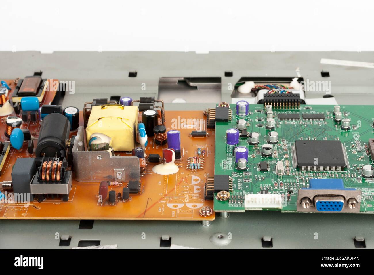 Two printed circuit board of LCD monitor, orange board is power , green ...