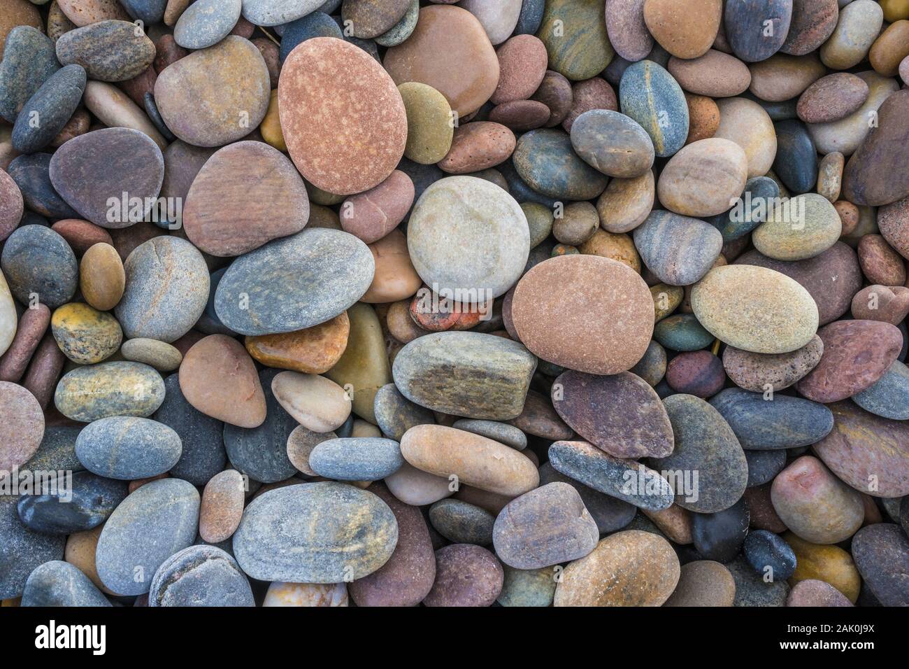 Pebble background on a scottish beach Stock Photo - Alamy