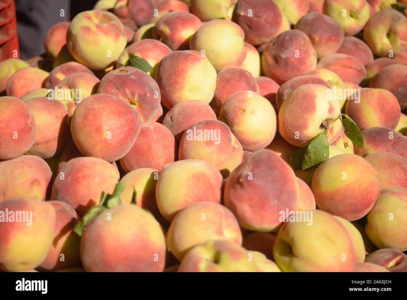 peaches in the market Stock Photo - Alamy