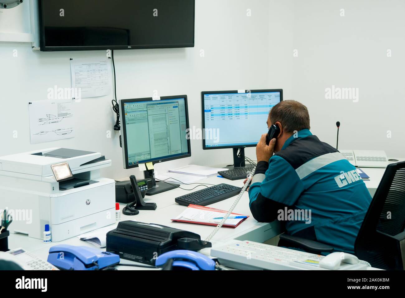 Man in control room of polypropylene factory Stock Photo - Alamy