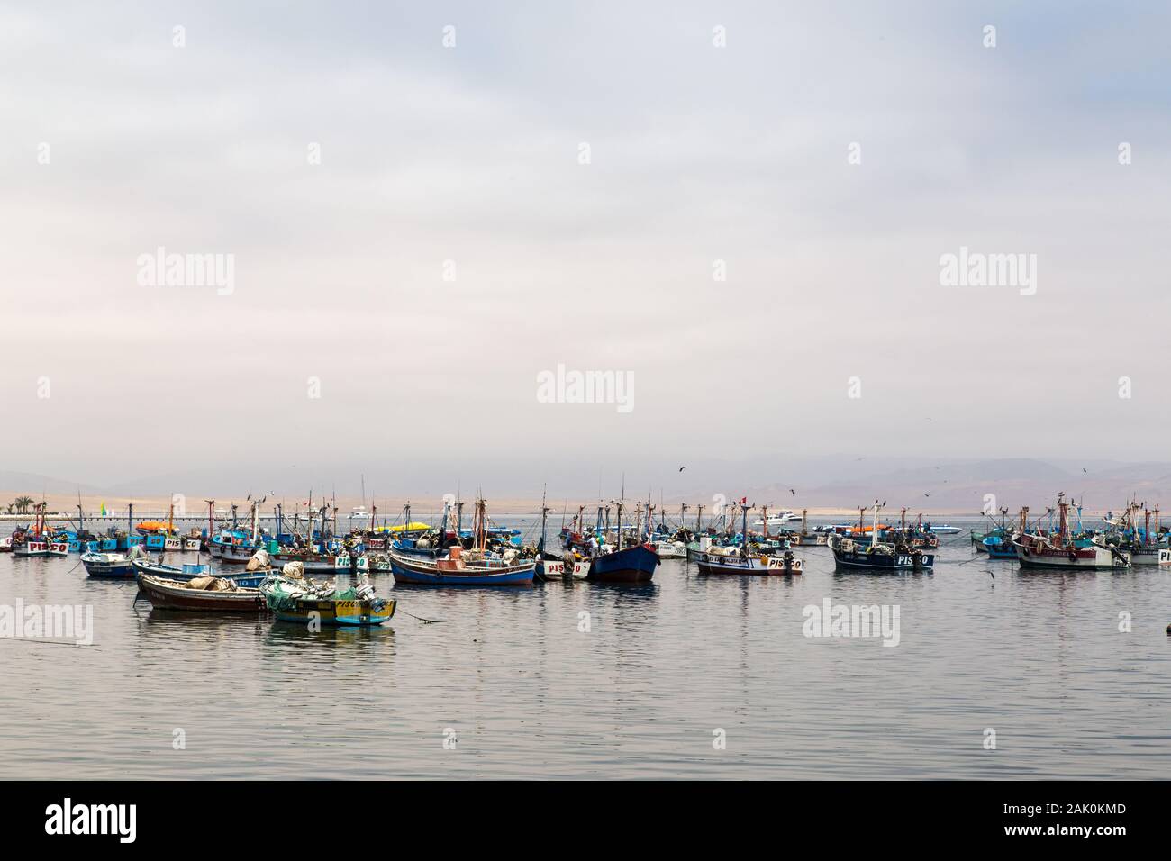Fishing boats in Paracas, Peru Stock Photo - Alamy