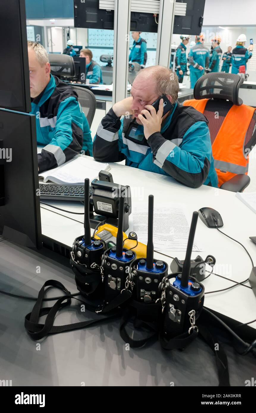 Men in control room of polypropylene factory Stock Photo - Alamy