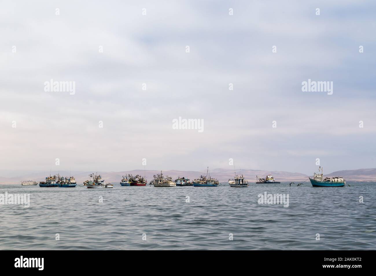 Fishing boats in Paracas, Peru Stock Photo - Alamy