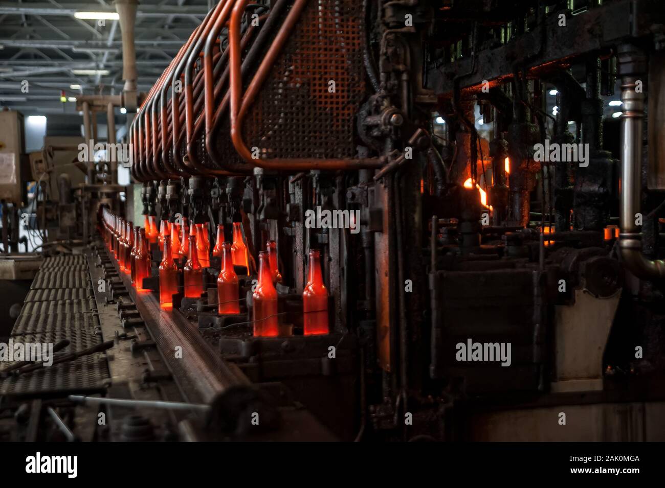 Plant for the production of bottles, glass plant Stock Photo - Alamy