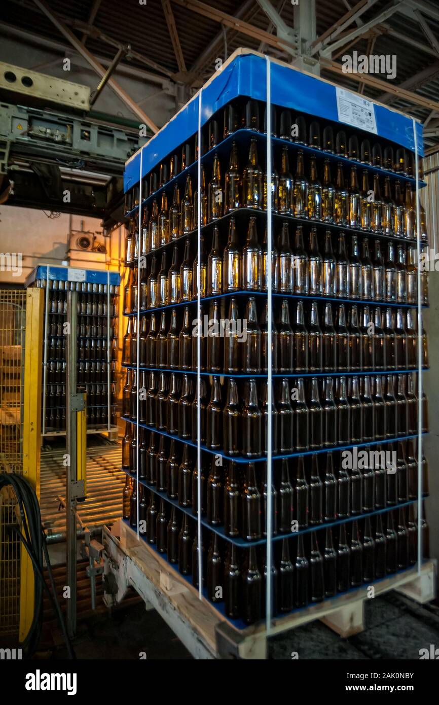 Packed clean bottles on glass factory Stock Photo - Alamy