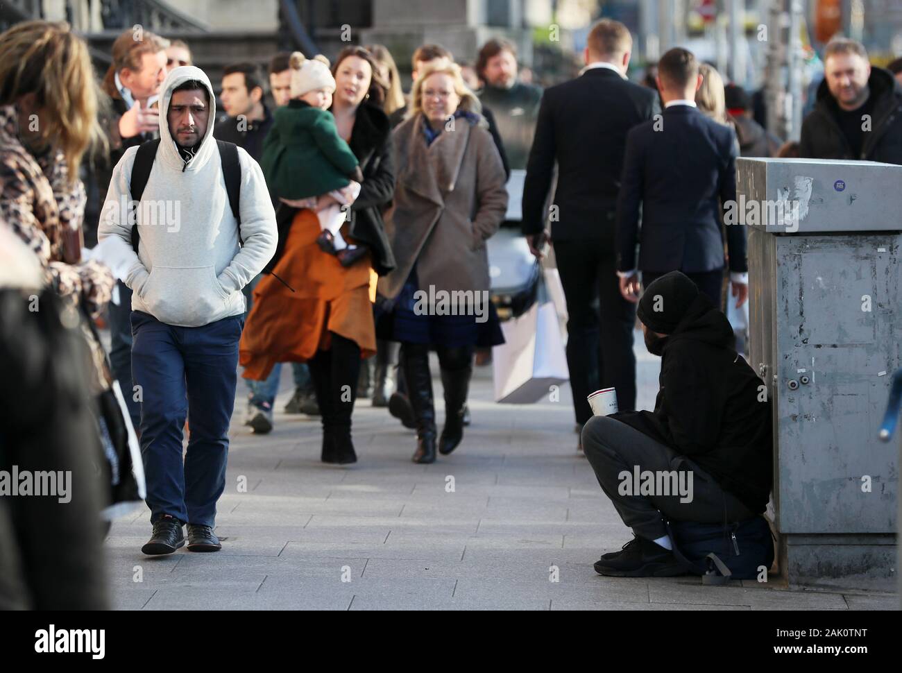 A homeless man begging on the streets of Dublin Stock Photo - Alamy