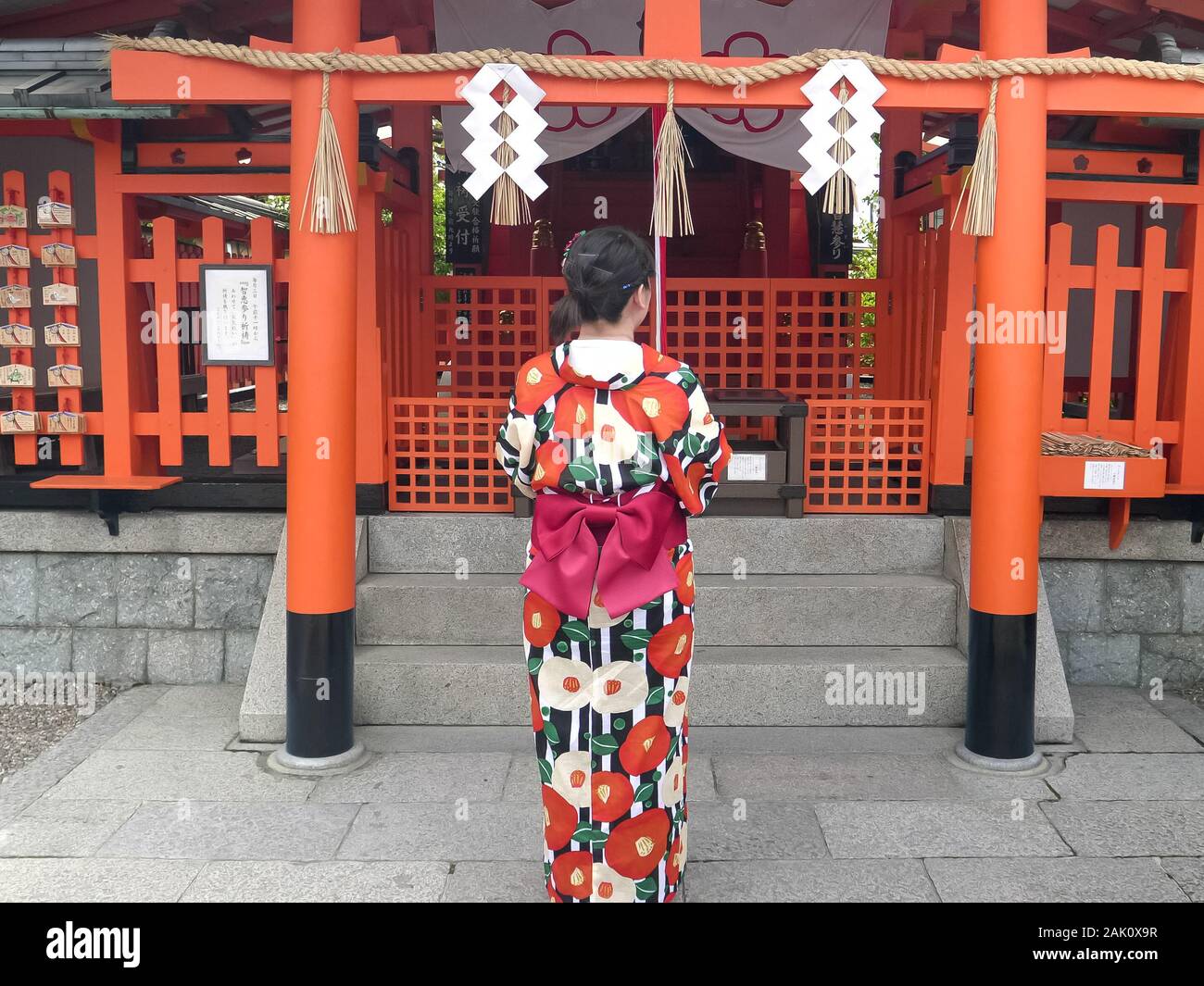 KYOTO, JAPAN - APRIL, 16, 2018: female japanese worshiper at fushimi ...