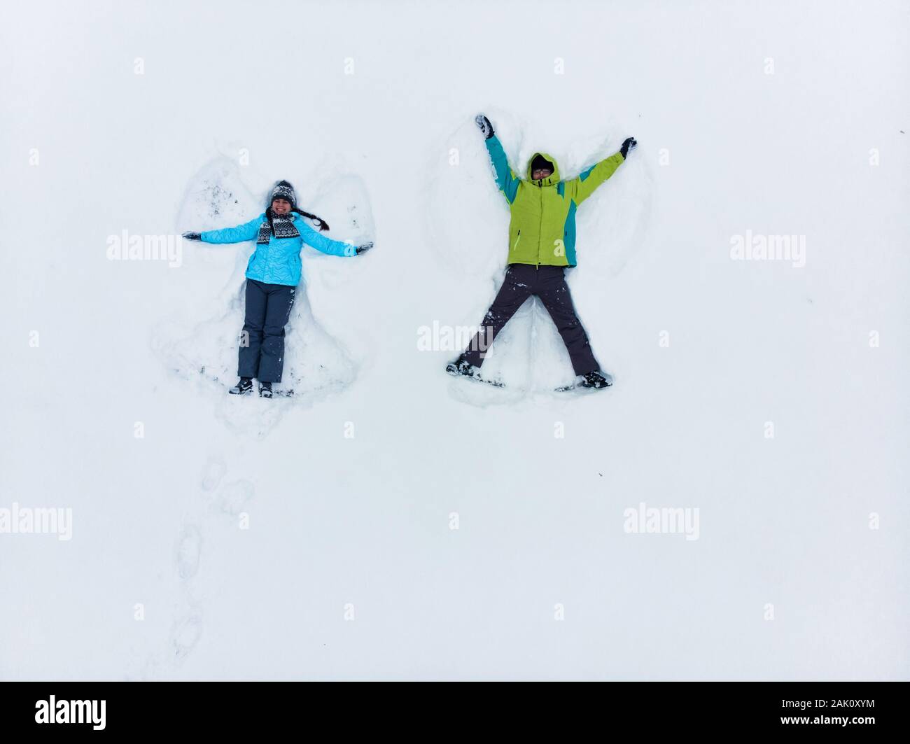 Snow angel couple hi-res stock photography and images - Alamy