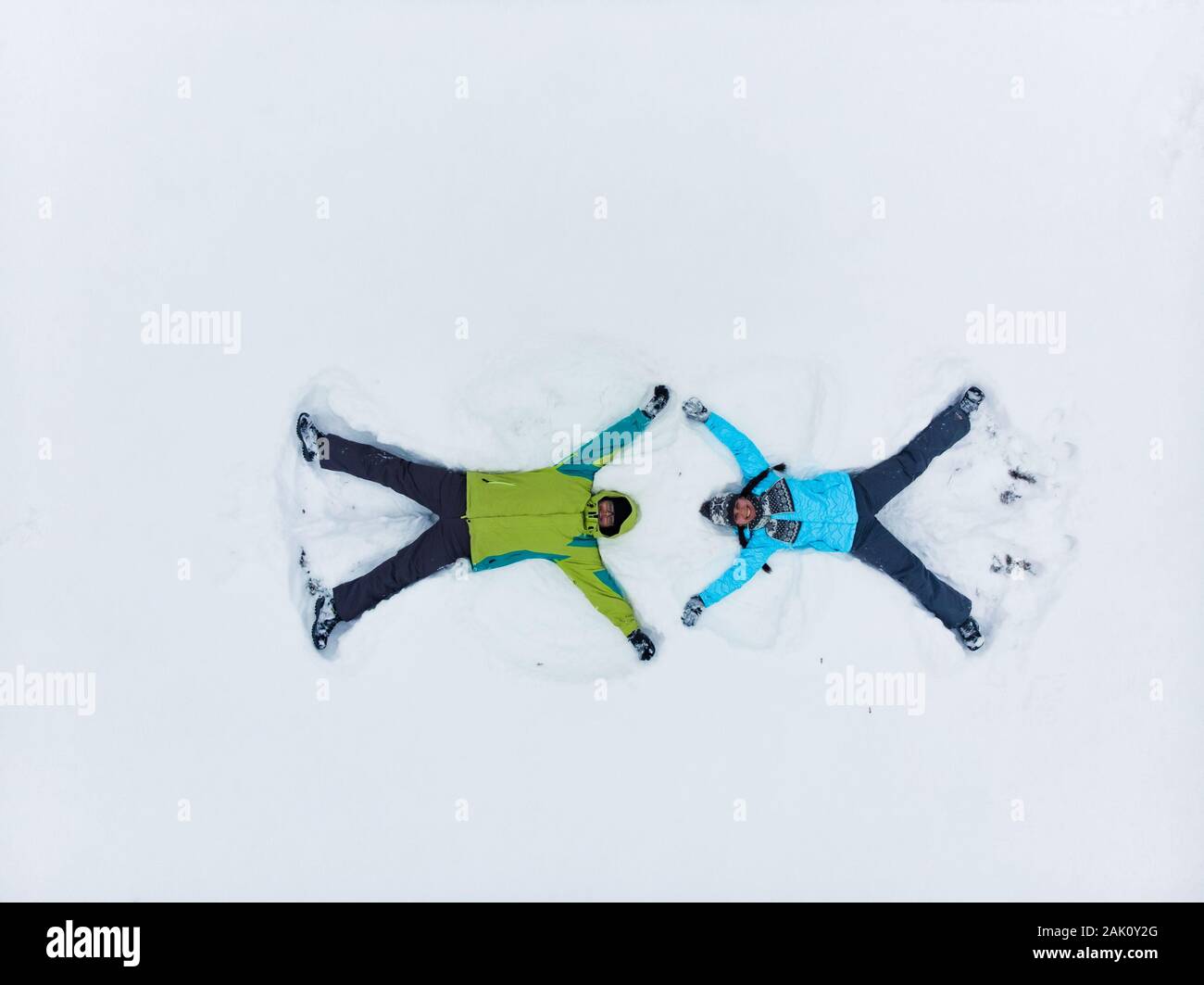 Snow angel couple hi-res stock photography and images - Alamy