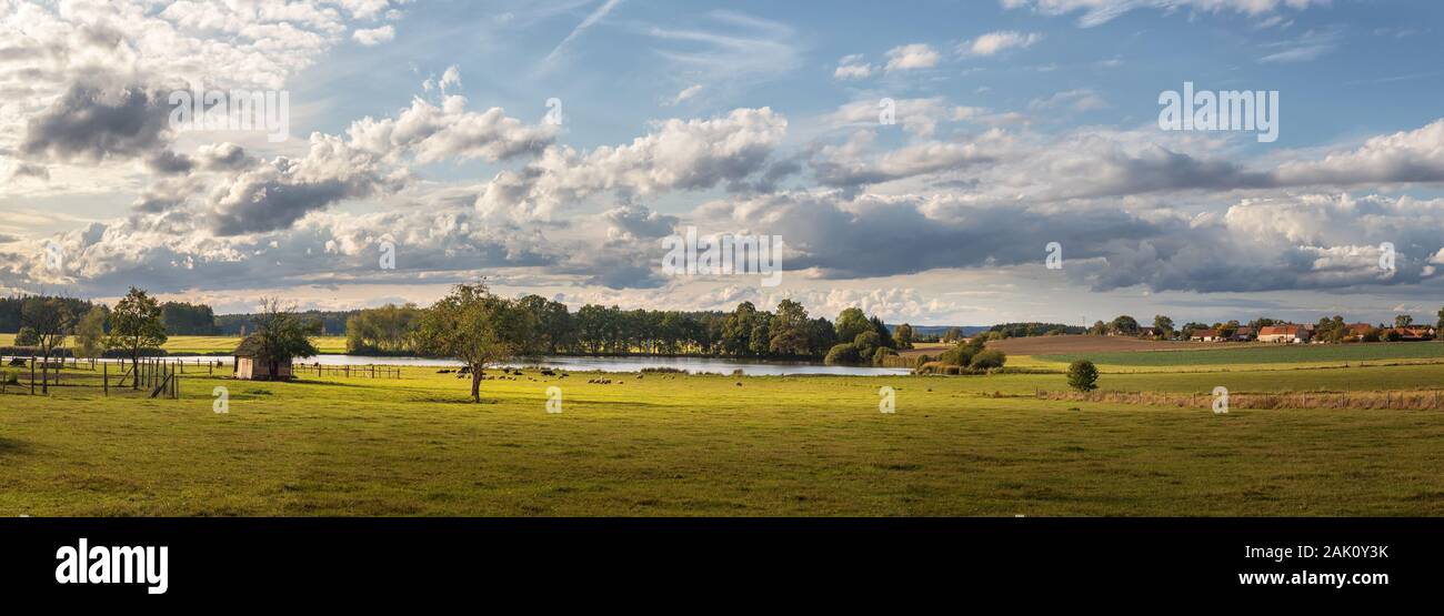 landscape with blue sky and clouds - panorama of rural countryside with ...