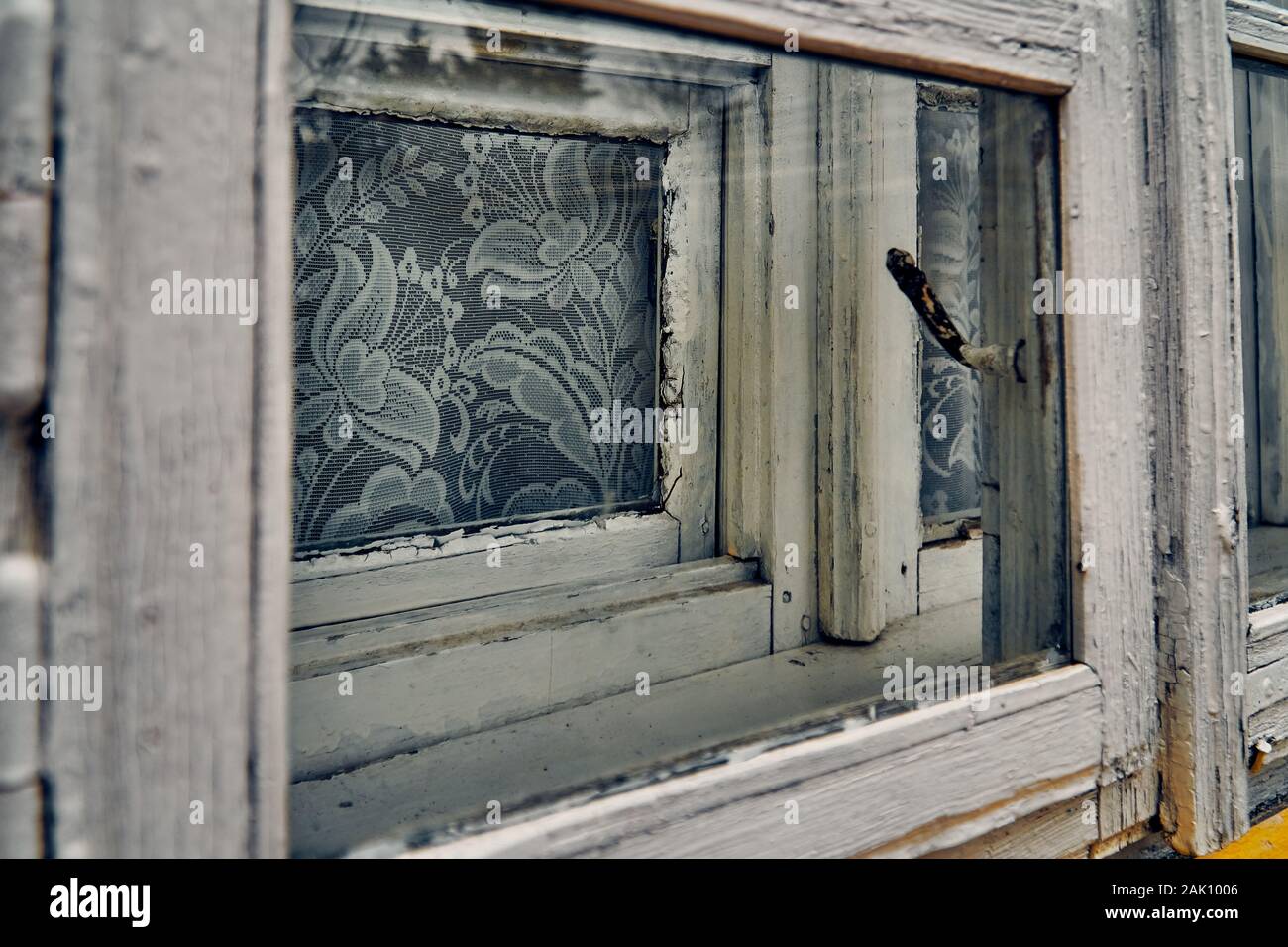 old wooden window frames - a terrible mysterious apocalyptic view: an abandoned house in the ...