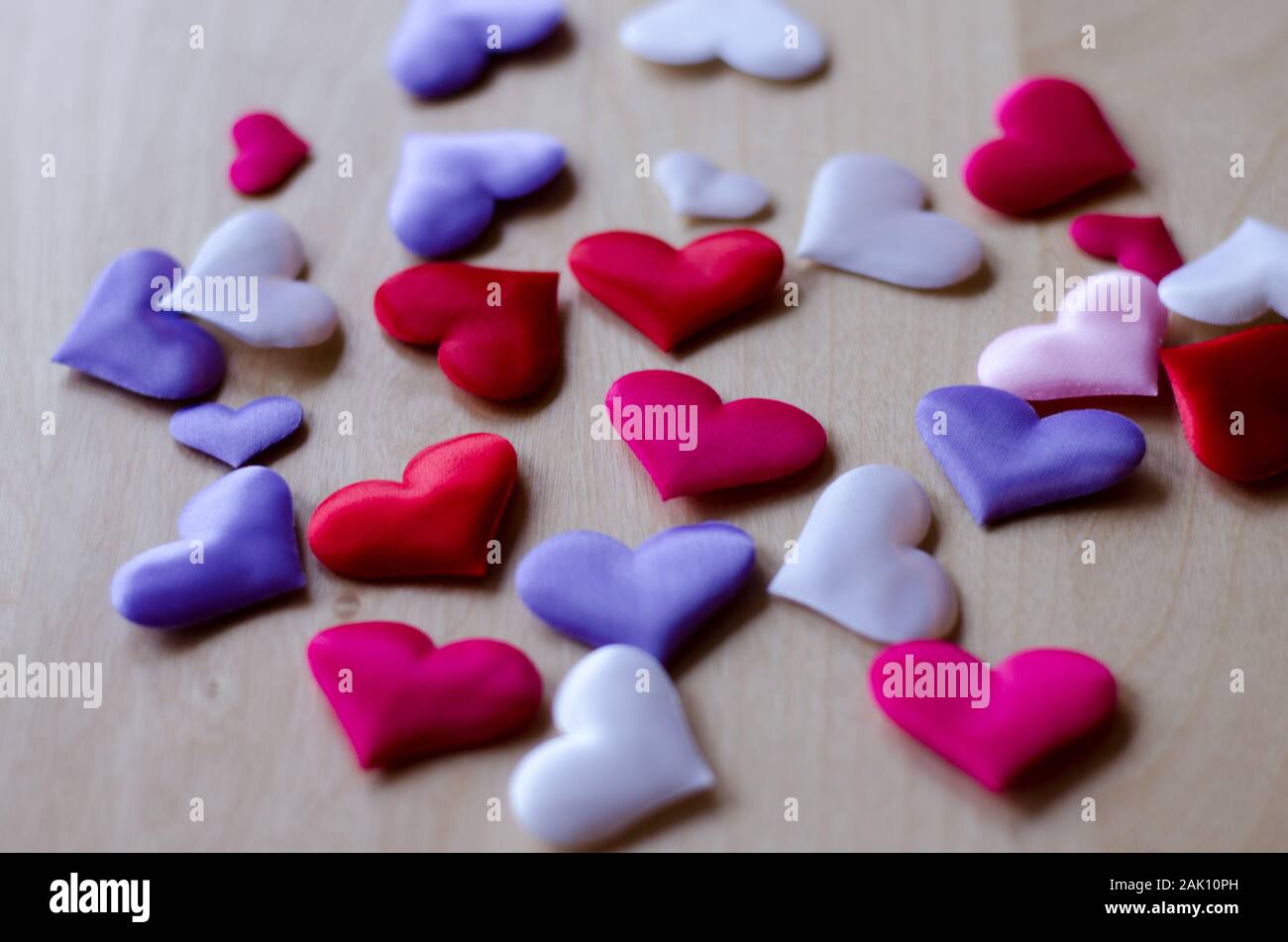 Hearts different colors sizes hi-res stock photography and images - Alamy