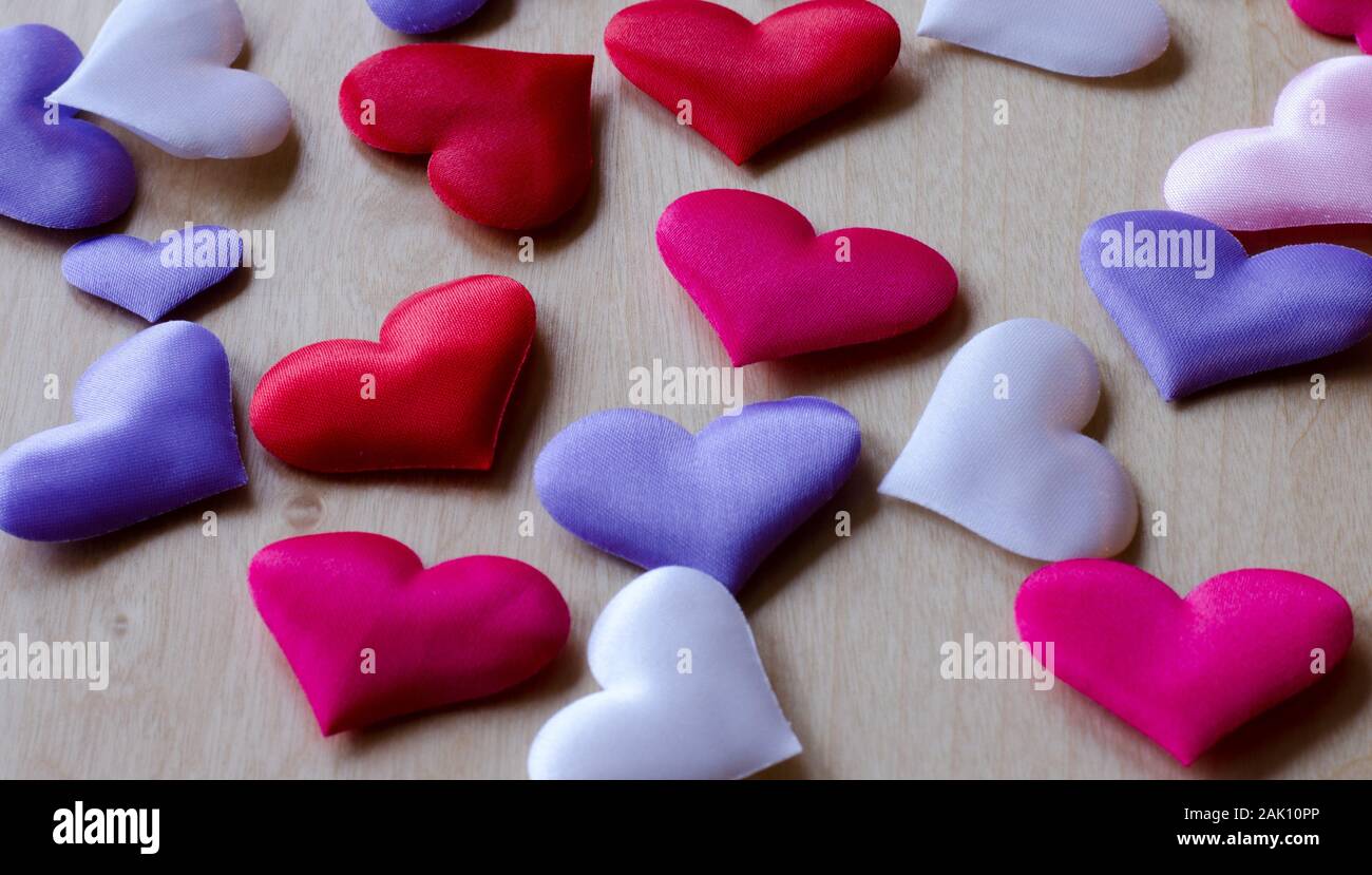Hearts different colors sizes hi-res stock photography and images - Alamy