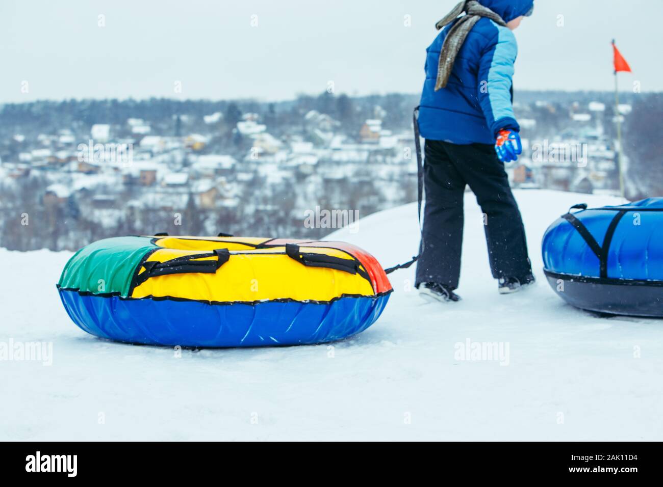 Sliding down tubing run snow hi-res stock photography and images - Alamy