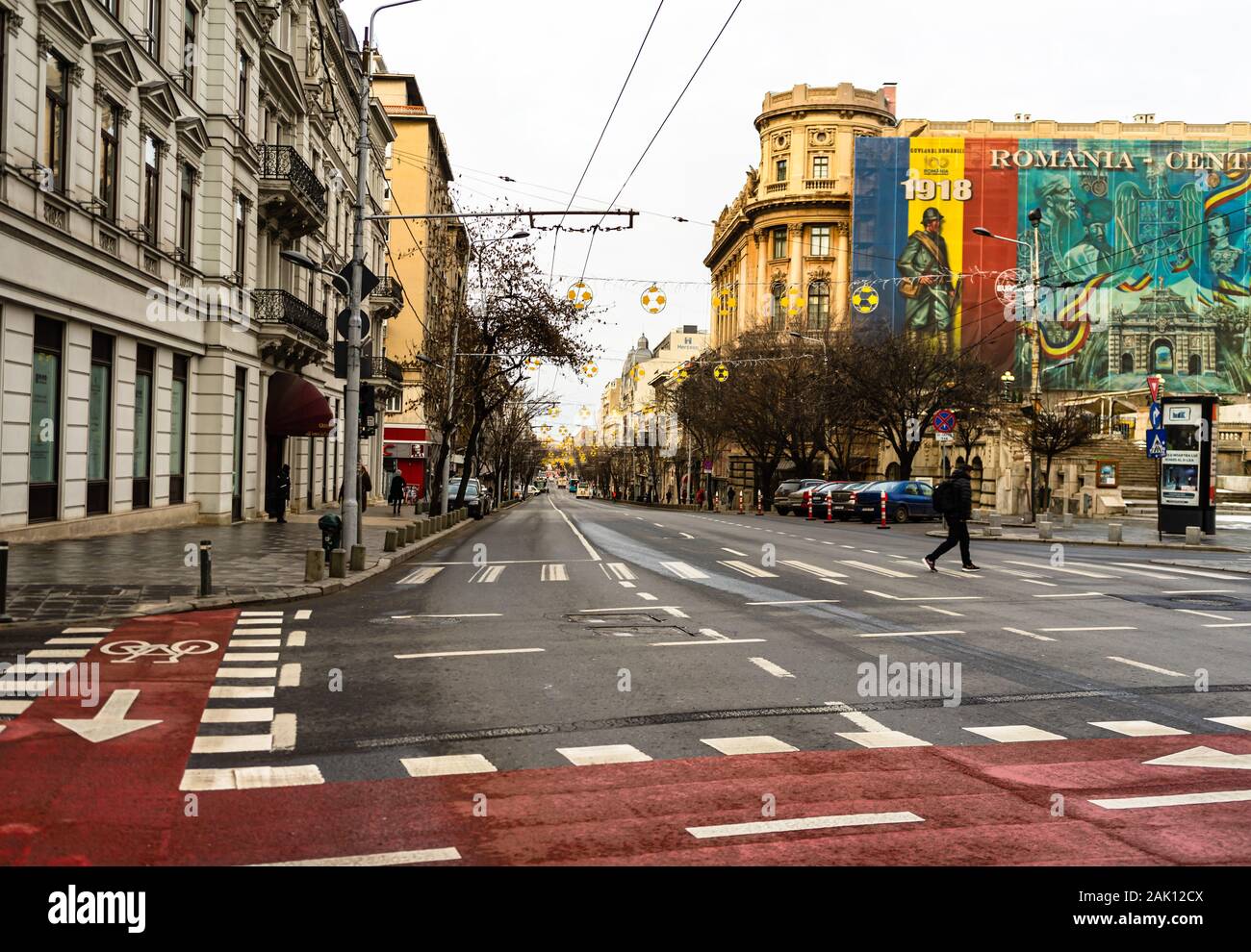 Early morning traffic and empty streets in downtown Bucharest, Romania ...
