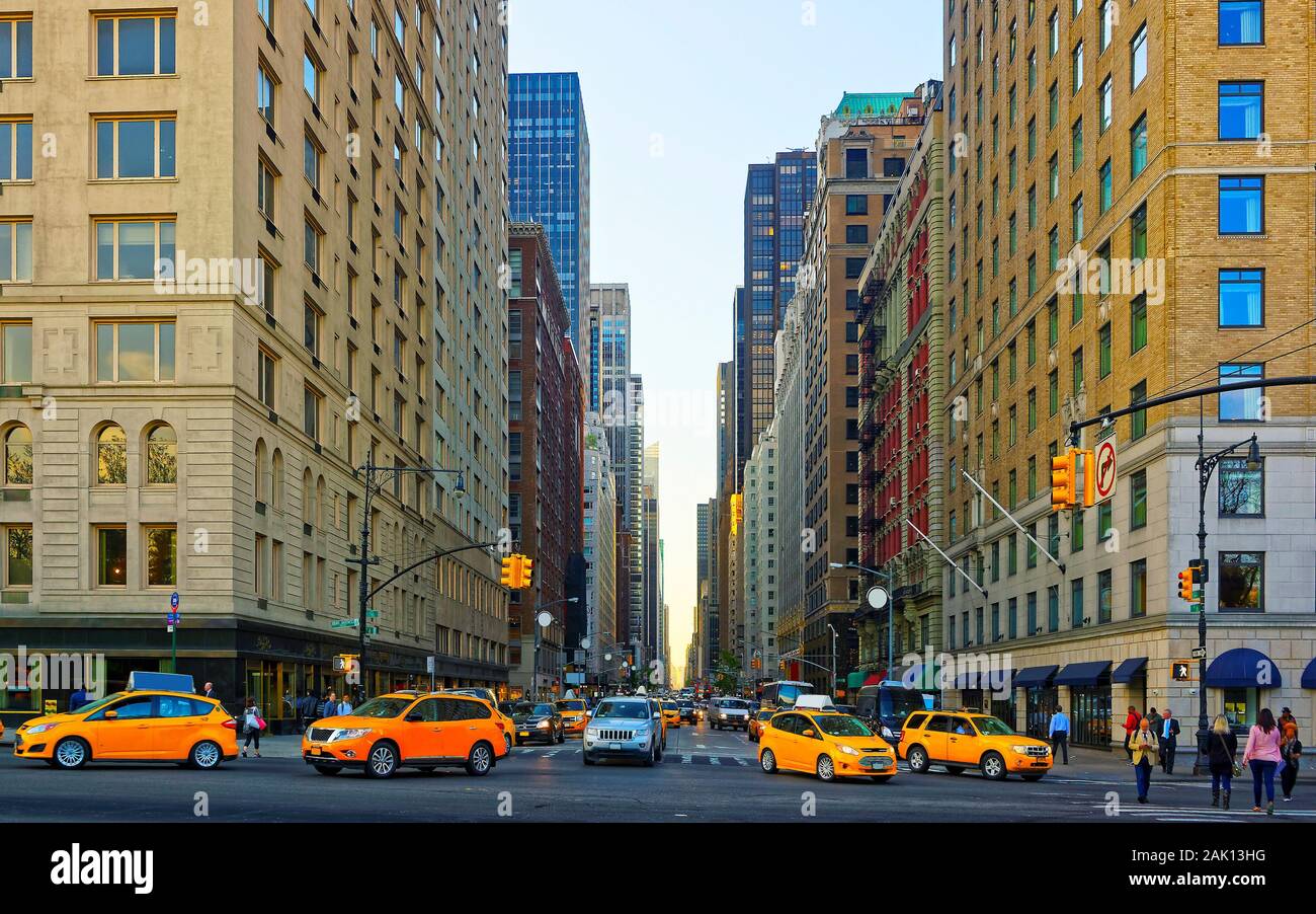 Crossroad on 6th avenue in Midtown Manhattan reflex Stock Photo - Alamy