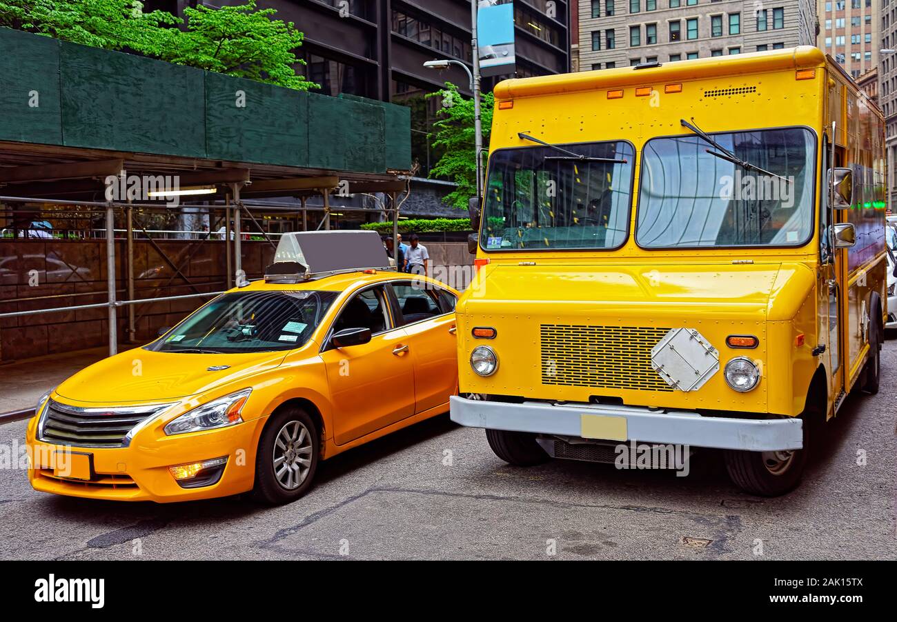 Traditional yellow taxi and a van in Manhattan street reflex Stock ...