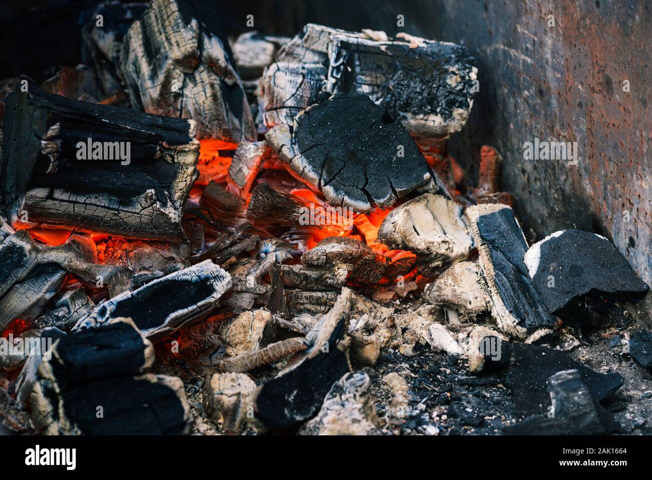 Coal in the fireplace. Extinguishing bonfire after burning wood ...