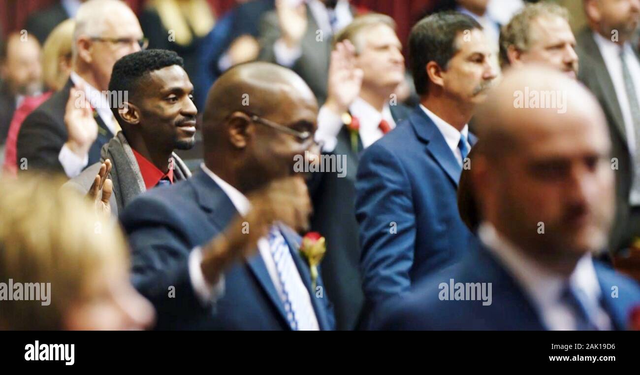 ST. LOUIS SUPERMAN, Bruce Franks Jr (red shirt) being sworn in to the ...