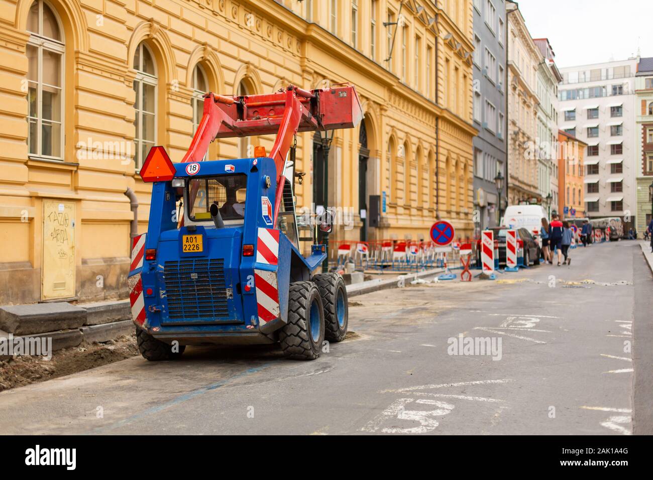 Replacement of curbs and repair of sidewalks in the old city. Workers ...