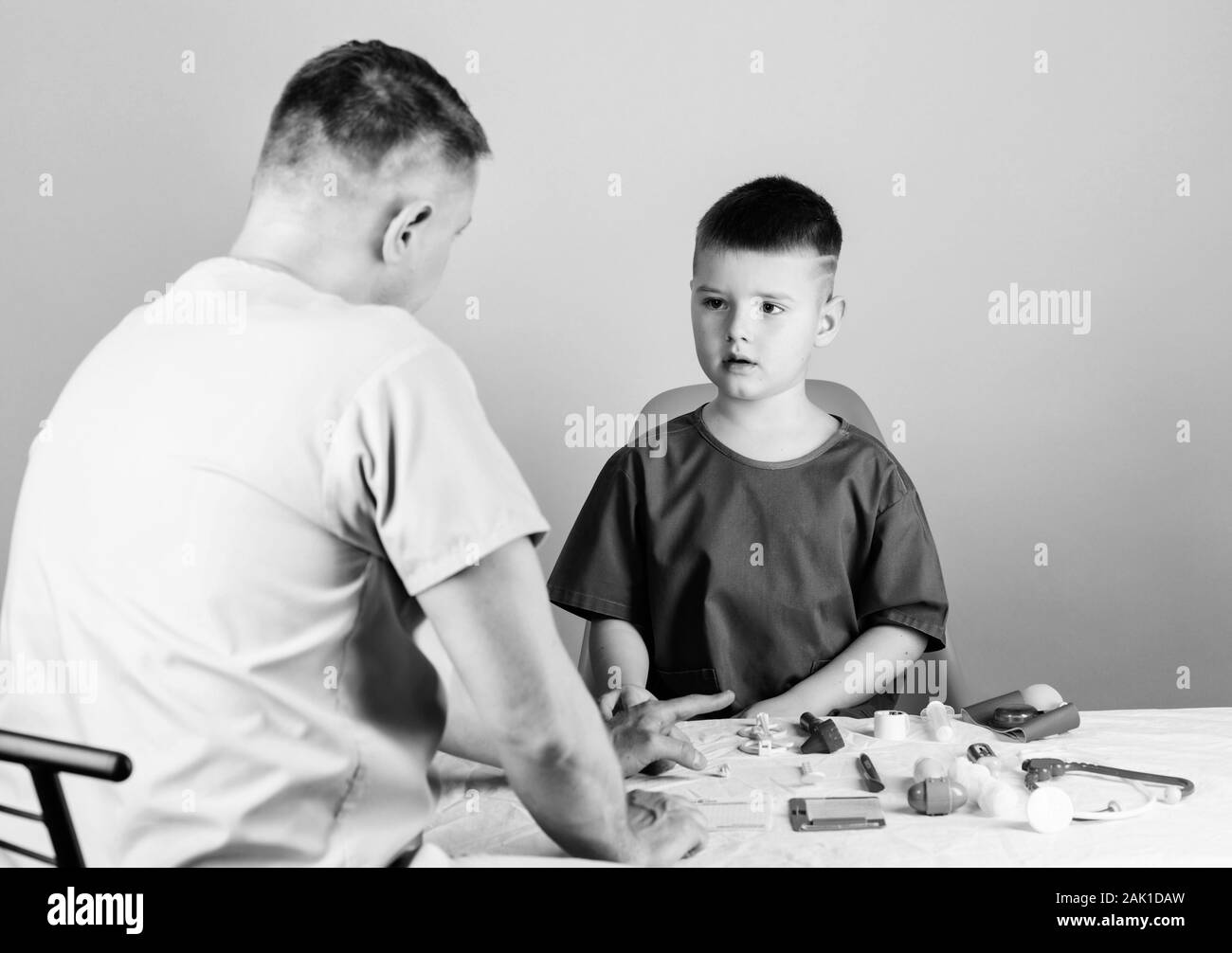 patient. medicine and health. happy child with father with stethoscope ...
