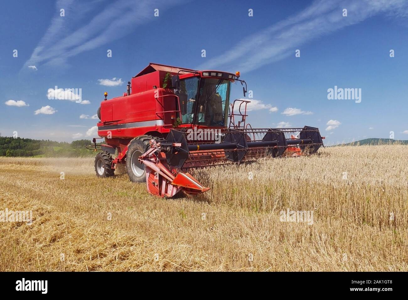 Red combine harvester hi-res stock photography and images - Alamy