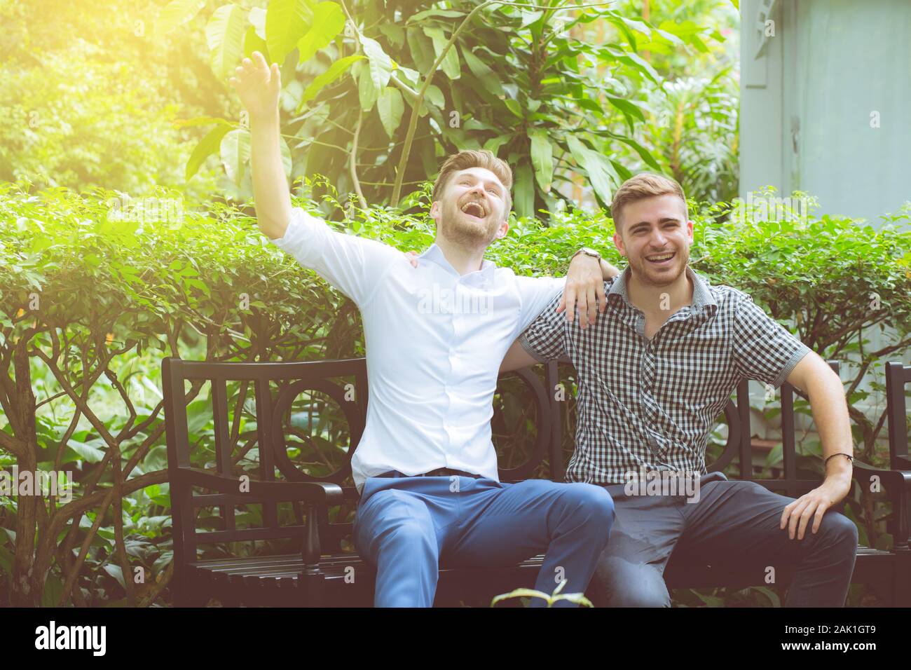 Two men laugh together hi-res stock photography and images - Alamy