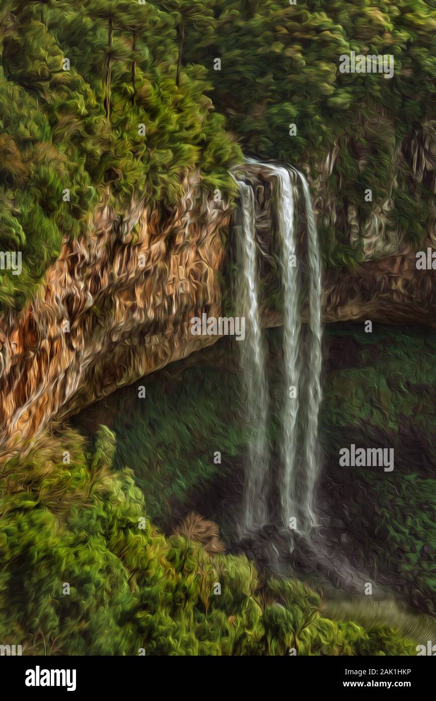 Caracol waterfall falling from rocky cliff with forest in a park near ...
