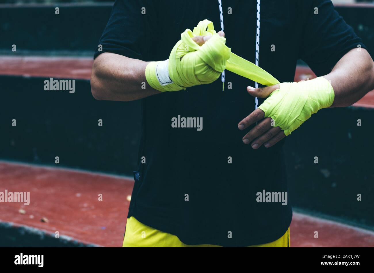 Boxer bandages around their arms ready to fight Stock Photo - Alamy