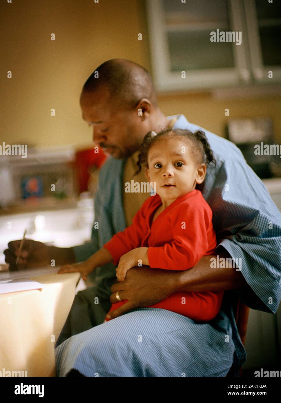 Adult children parents paperwork hi-res stock photography and images ...