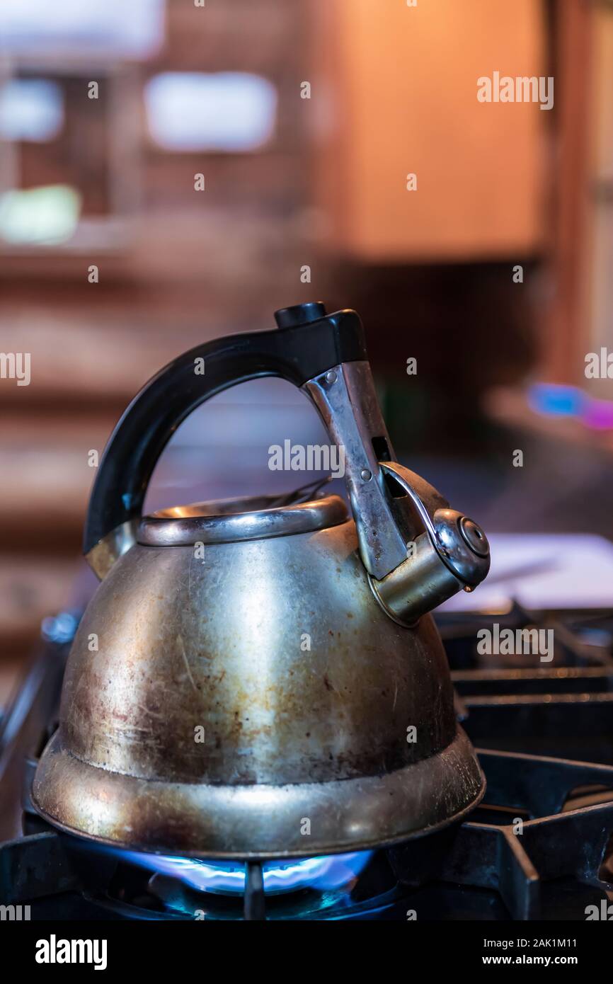 Old tea kettle on range in Elizabeth Parker Hut on a cold September day ...