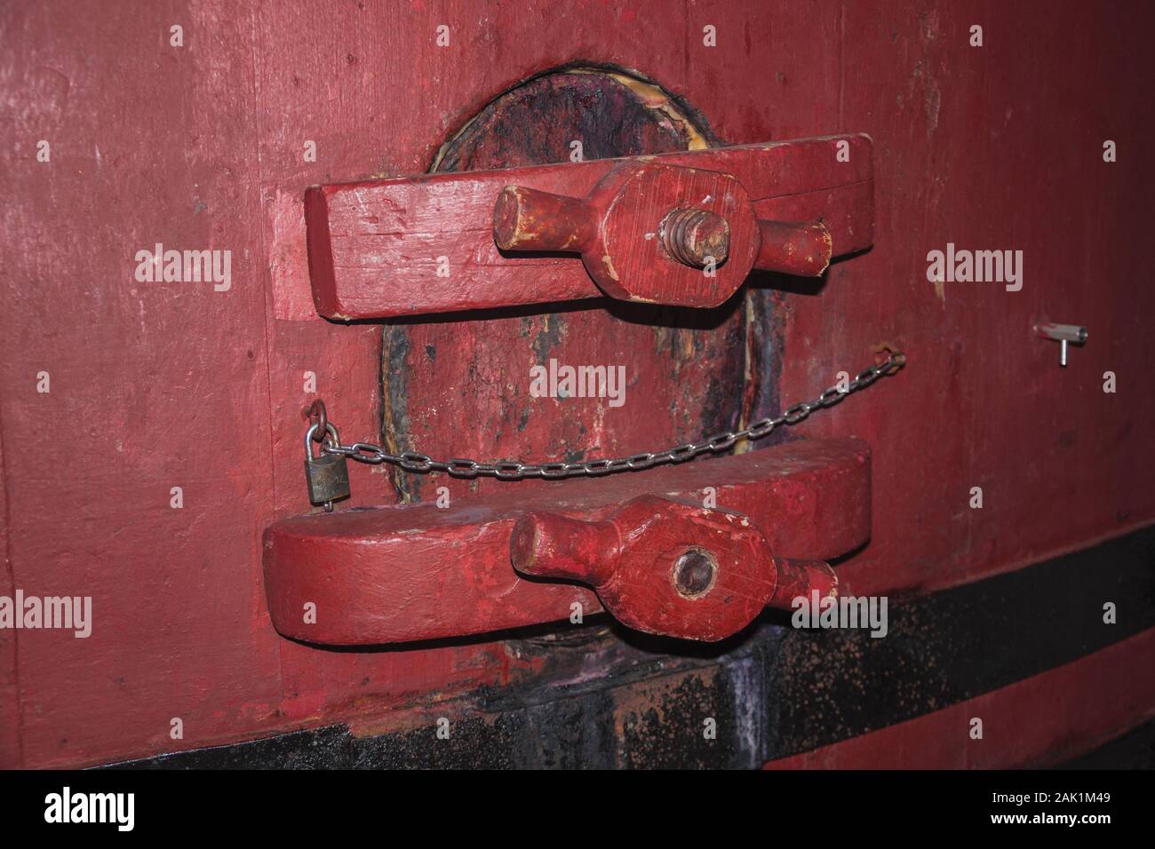 Maintenance hatch in an old wood storage tank for wine at the Aurora ...