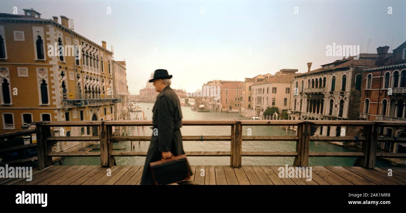 Man crossing bridge hi-res stock photography and images - Alamy