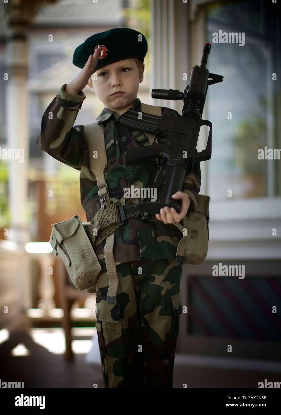 Young boy poses in front hi-res stock photography and images - Alamy