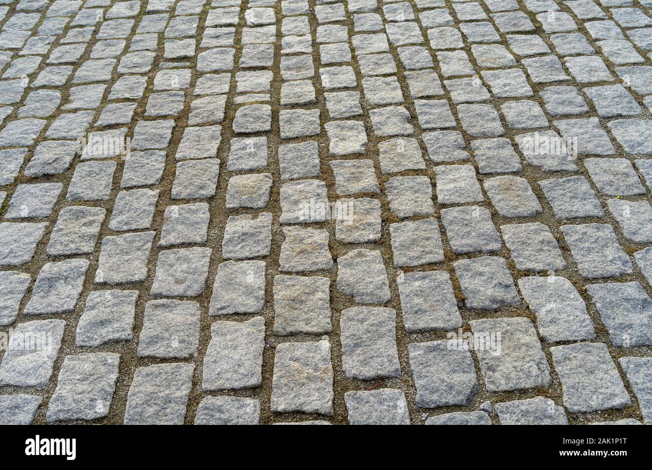 Old cobblestone pavement in the ancient European city Stock Photo - Alamy