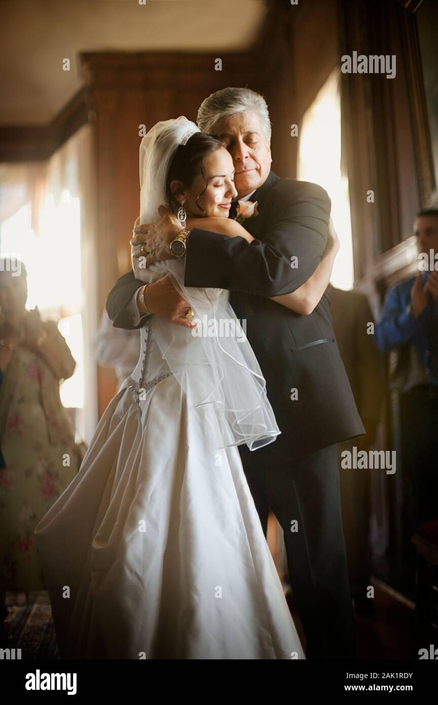 Young bride hugging her father on her wedding day Stock Photo - Alamy