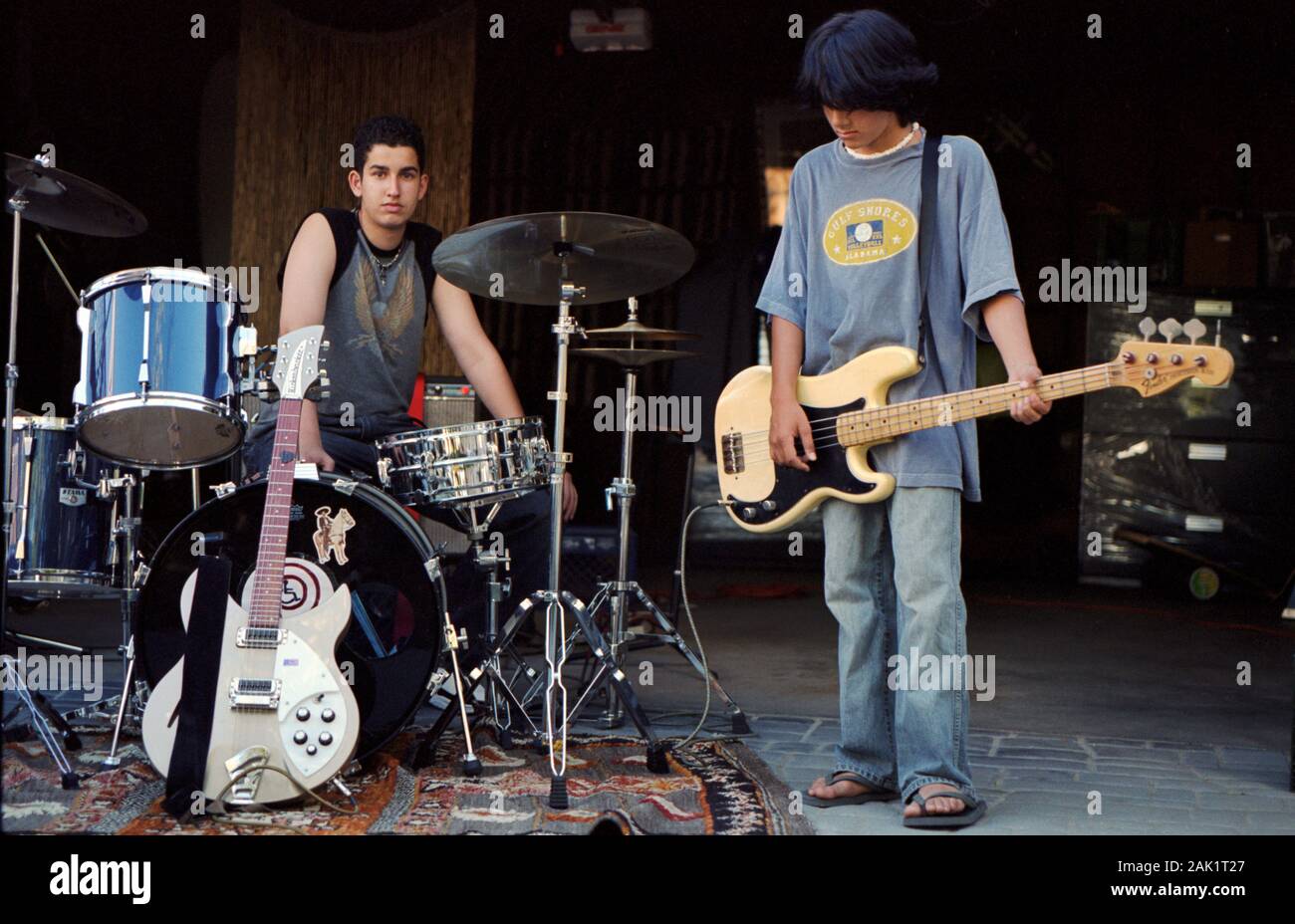 Portrait of two teenage boys with their musical instruments Stock Photo ...