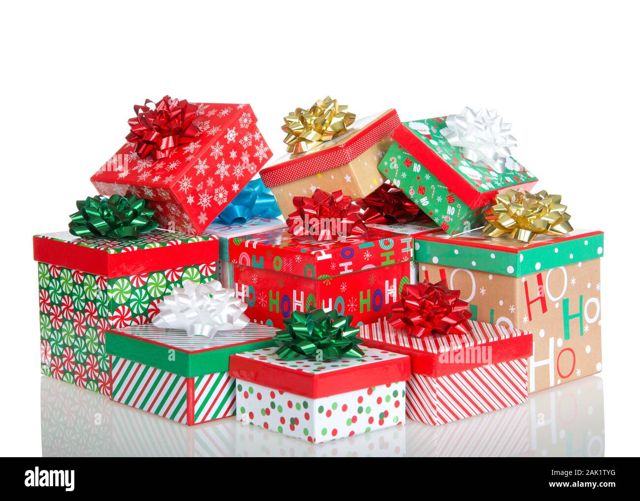 Piles of small colorful bright Christmas holiday presents with ribbons ...