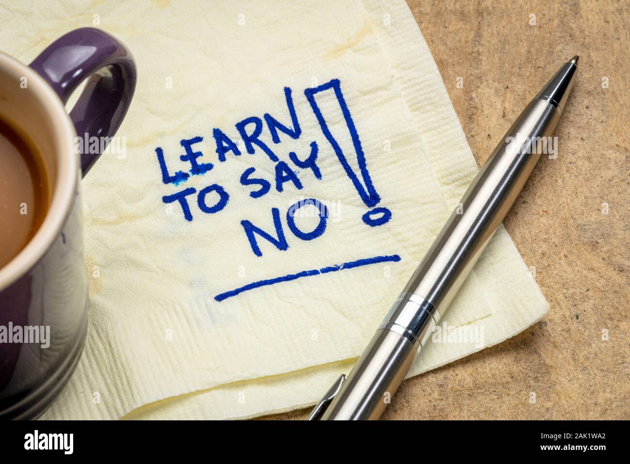 learn to say no advice - handwriting on a napkin with cup of coffee ...