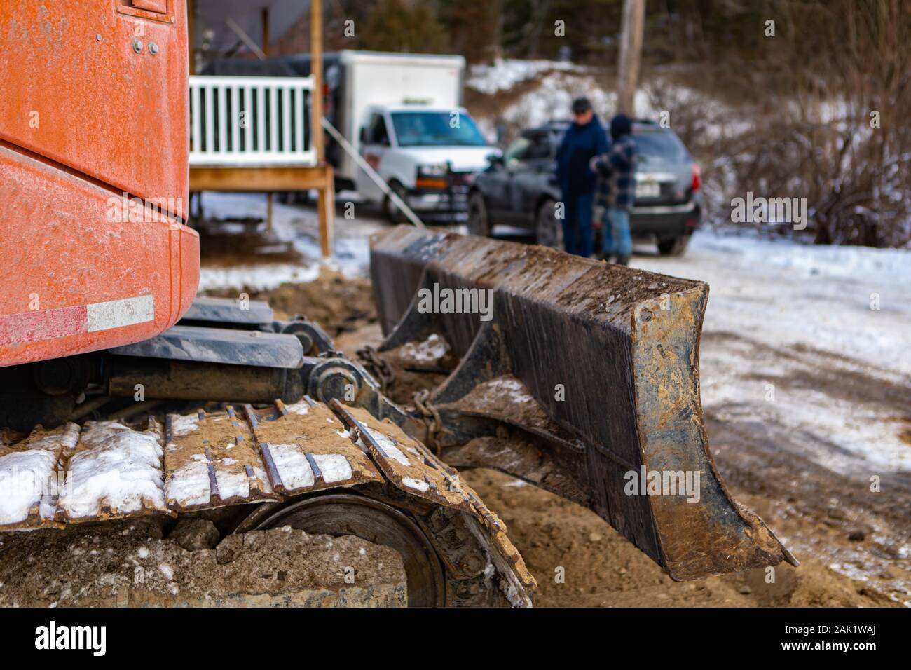 Close up details of a backfill blade, aka dozer, of a mini excavator at ...