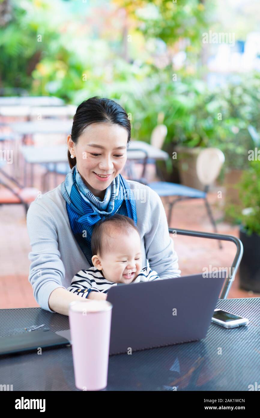 Baby working on laptop hi-res stock photography and images - Alamy