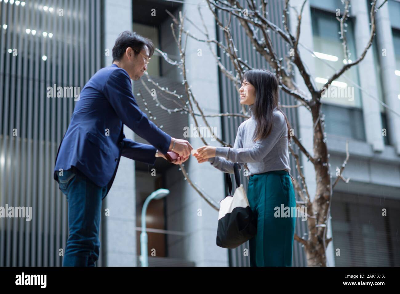 Exchanging business card hi-res stock photography and images - Alamy