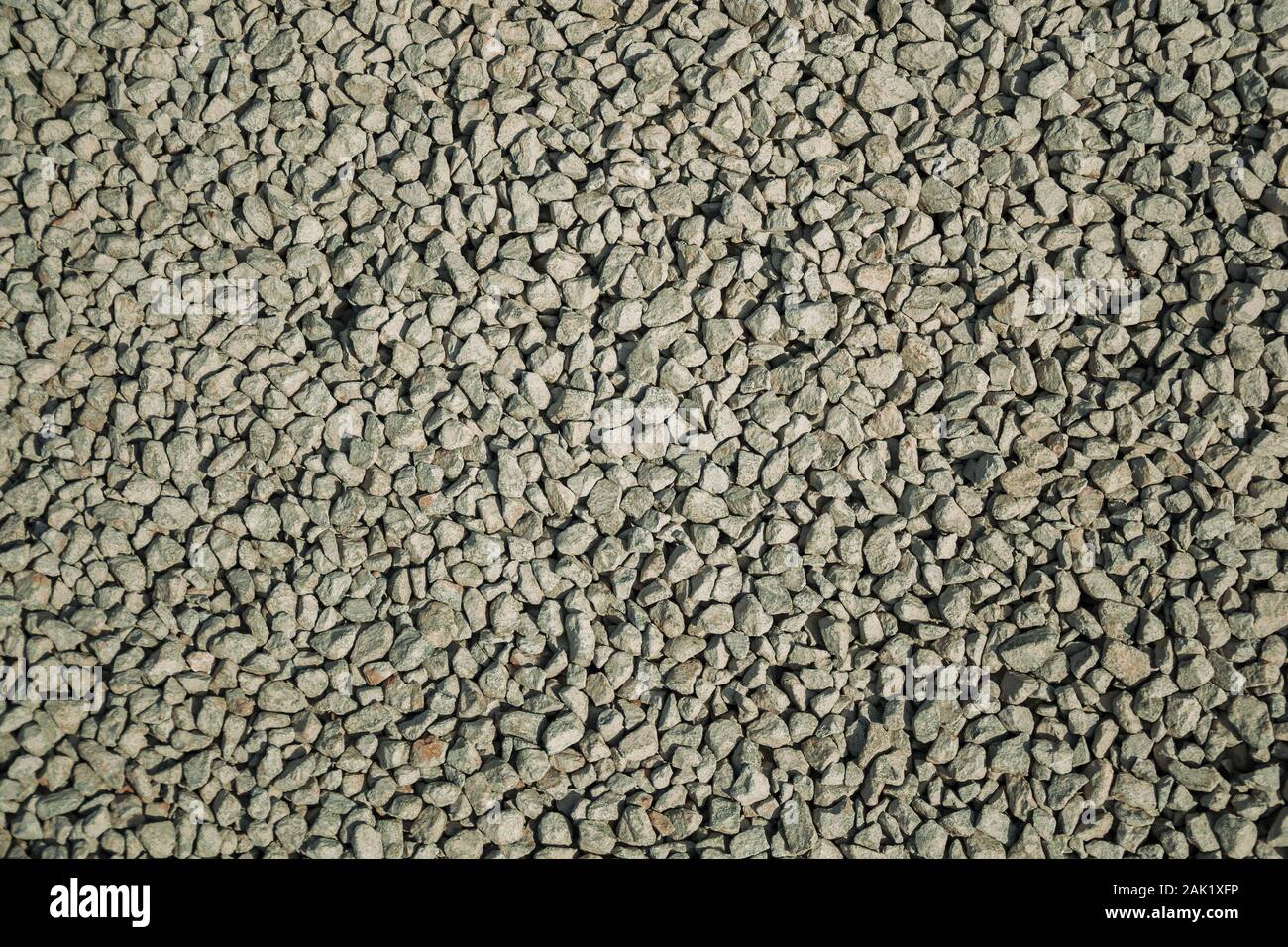 Detail of rough gravel background in a road near Bento Goncalves. A ...