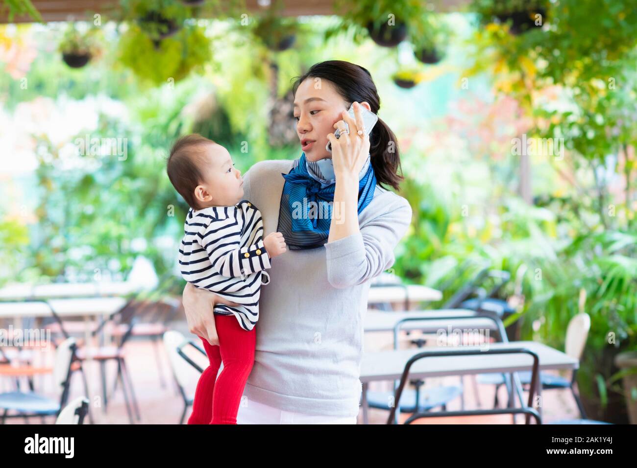 Baby asian talking hi-res stock photography and images - Alamy