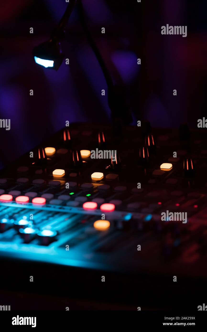 Professional concert sound mixer with sliders and regulators, audio ...